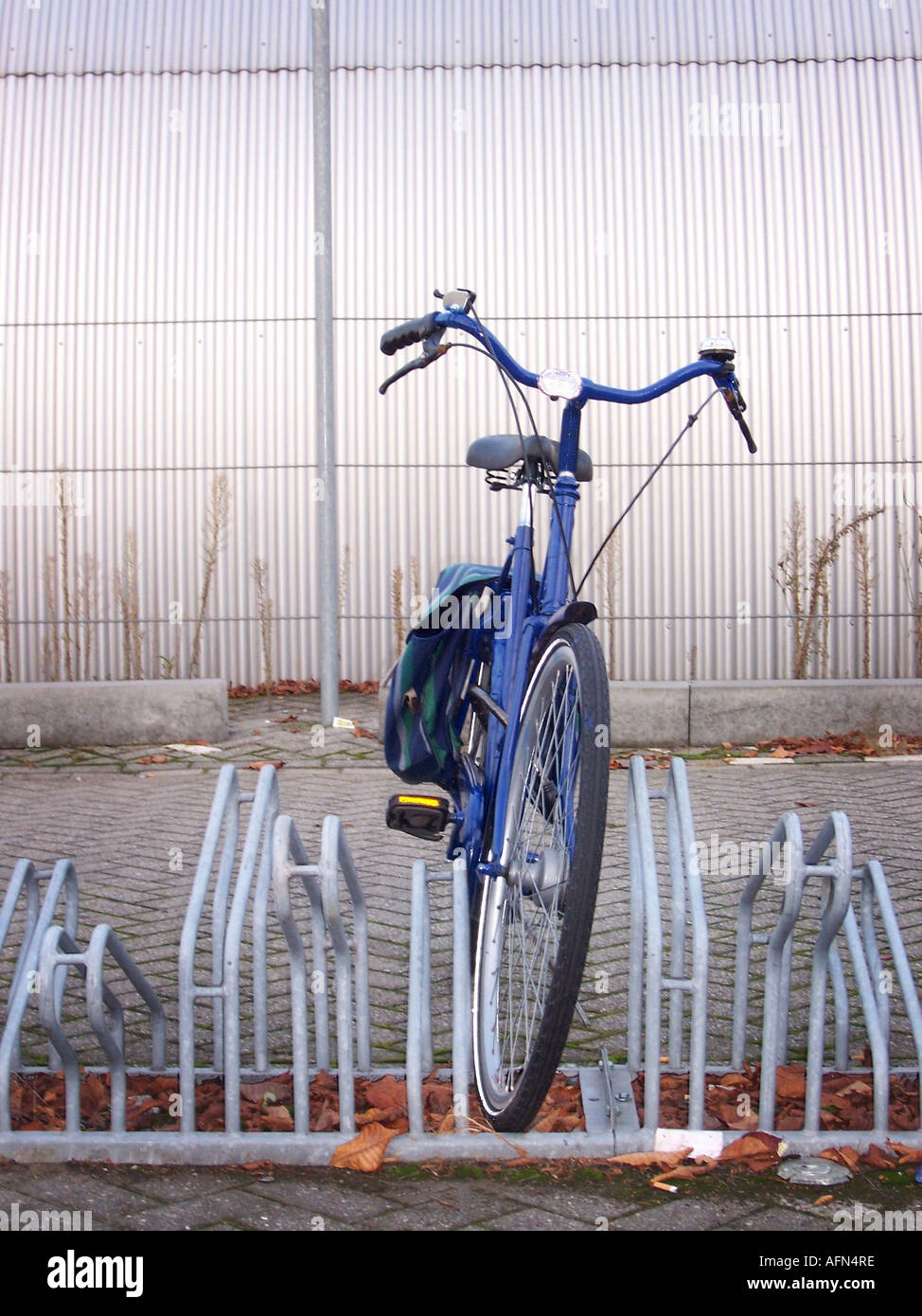 Single bike in bicycle rack Stock Photo - Alamy