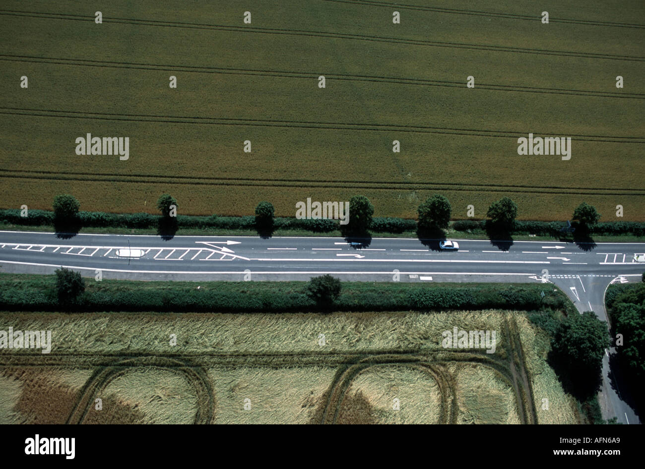 Aerial view of road through fields Stock Photo - Alamy