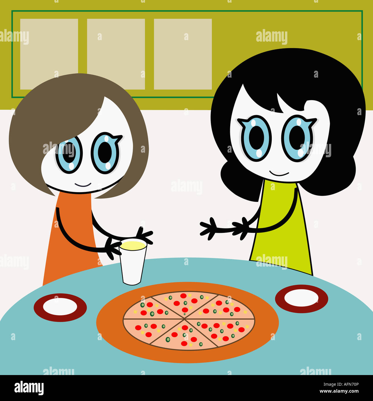 Two girls at a table with a pizza Stock Photo - Alamy