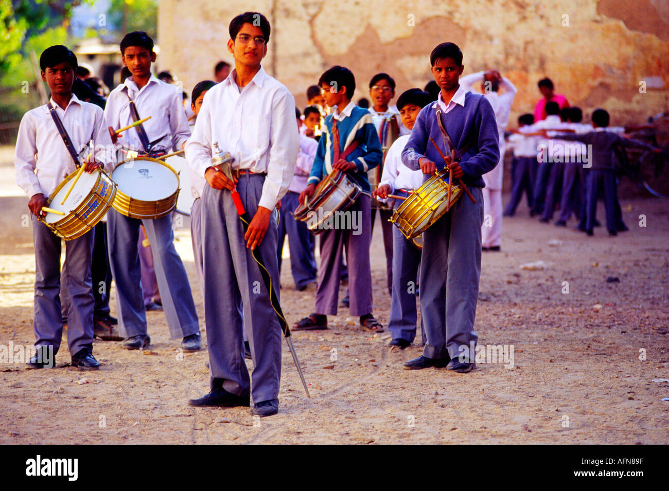 School marching practice outdoors for a middle school all children in ...