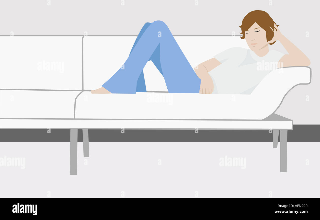Young woman reclining on a couch Stock Photo - Alamy