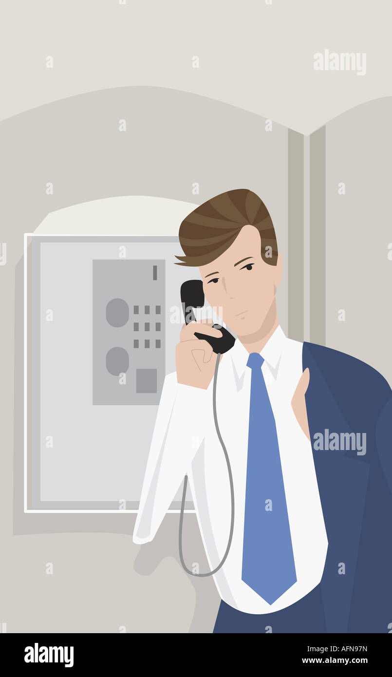 Businessman using a pay phone Stock Photo - Alamy