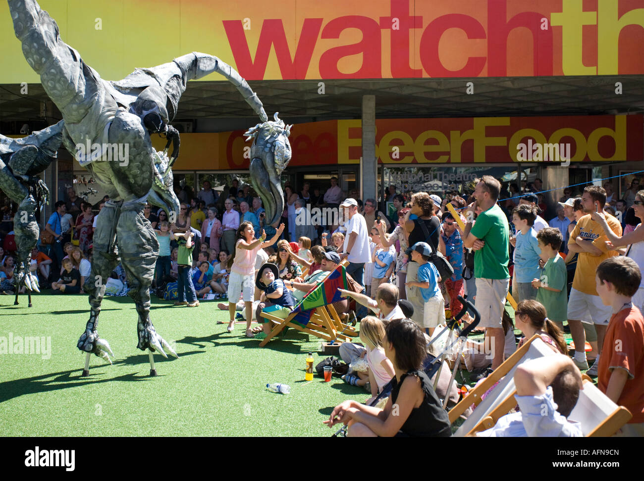 Spectators watching open air performance Stock Photo - Alamy