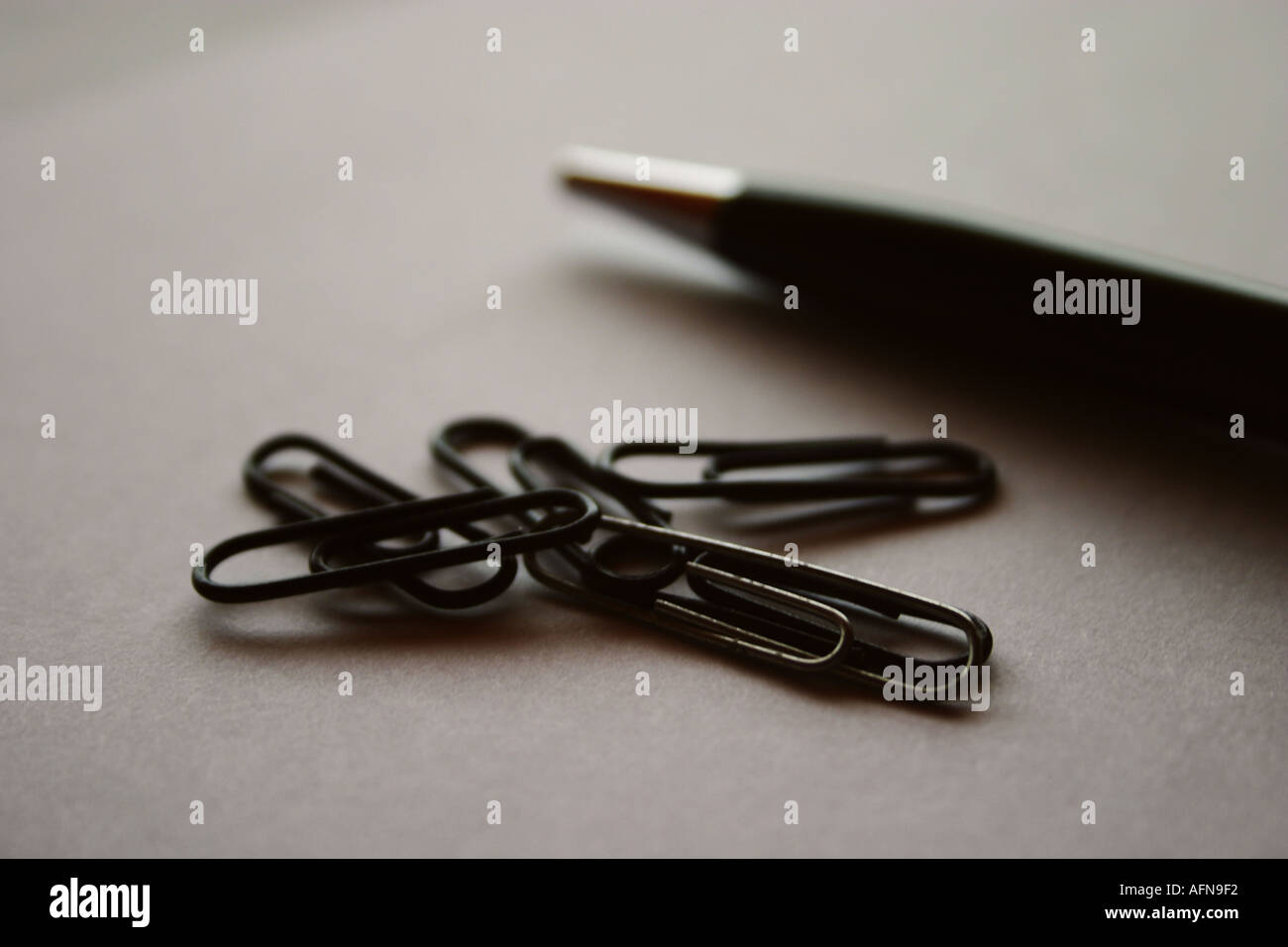 Paperclips and Pen Stock Photo - Alamy