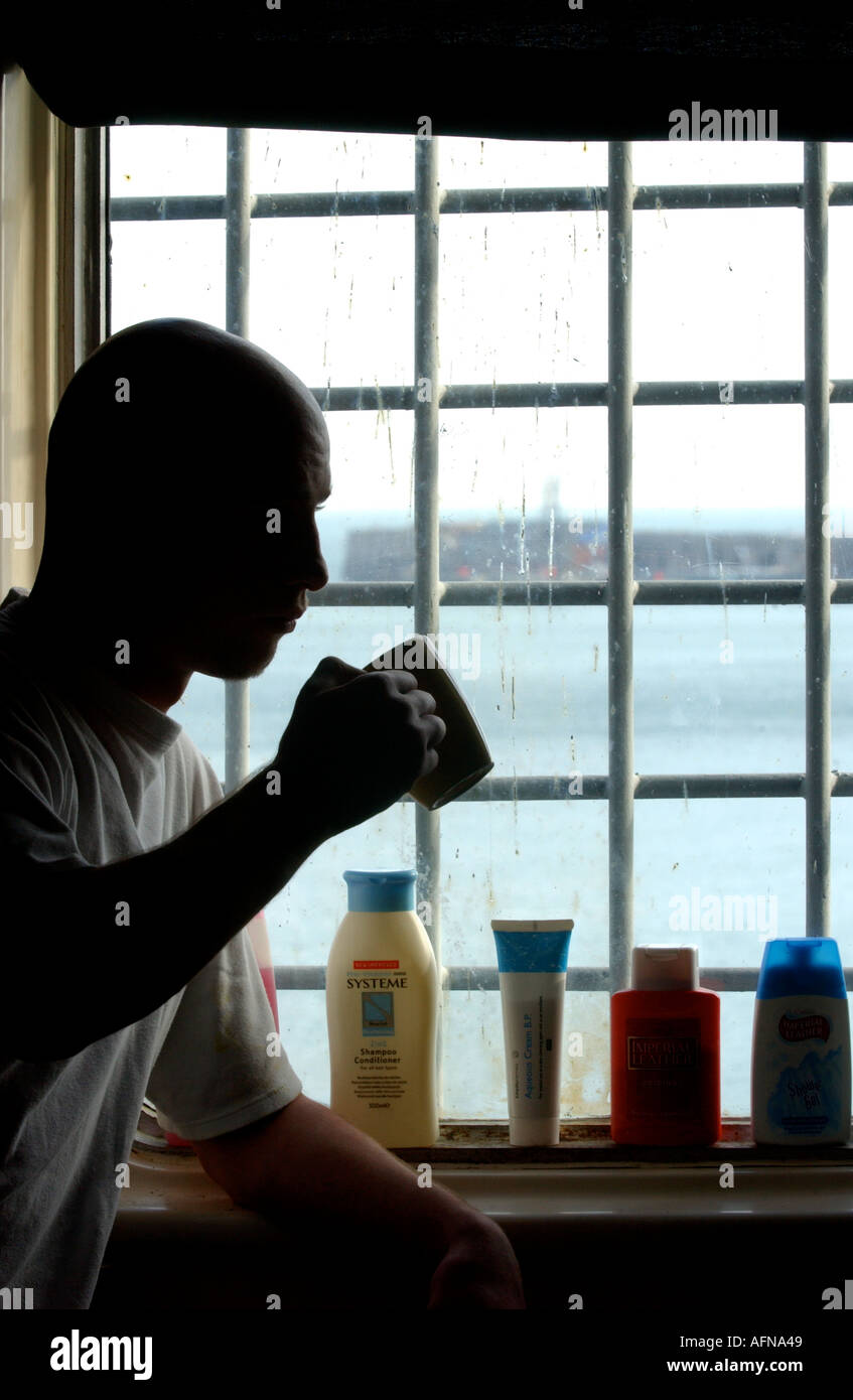 Silhouette of a prisoner on board HMP Weare the Prison Ship at Portland ...