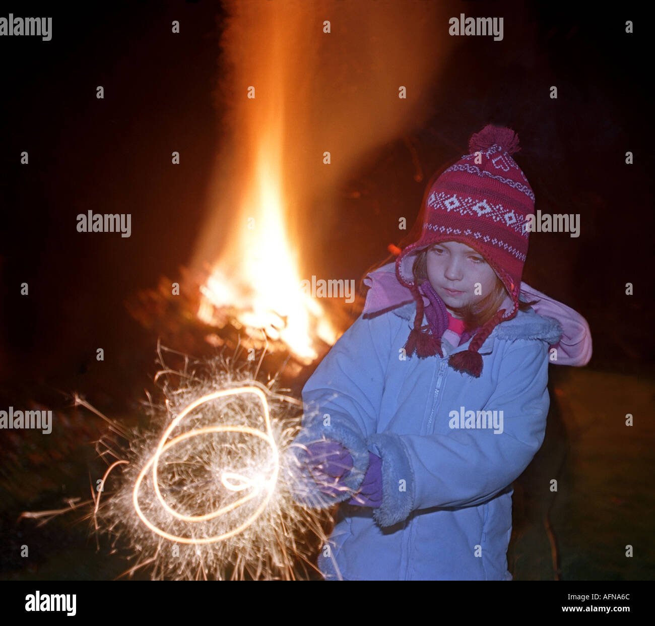 Bonfire with fireworks hi-res stock photography and images - Alamy