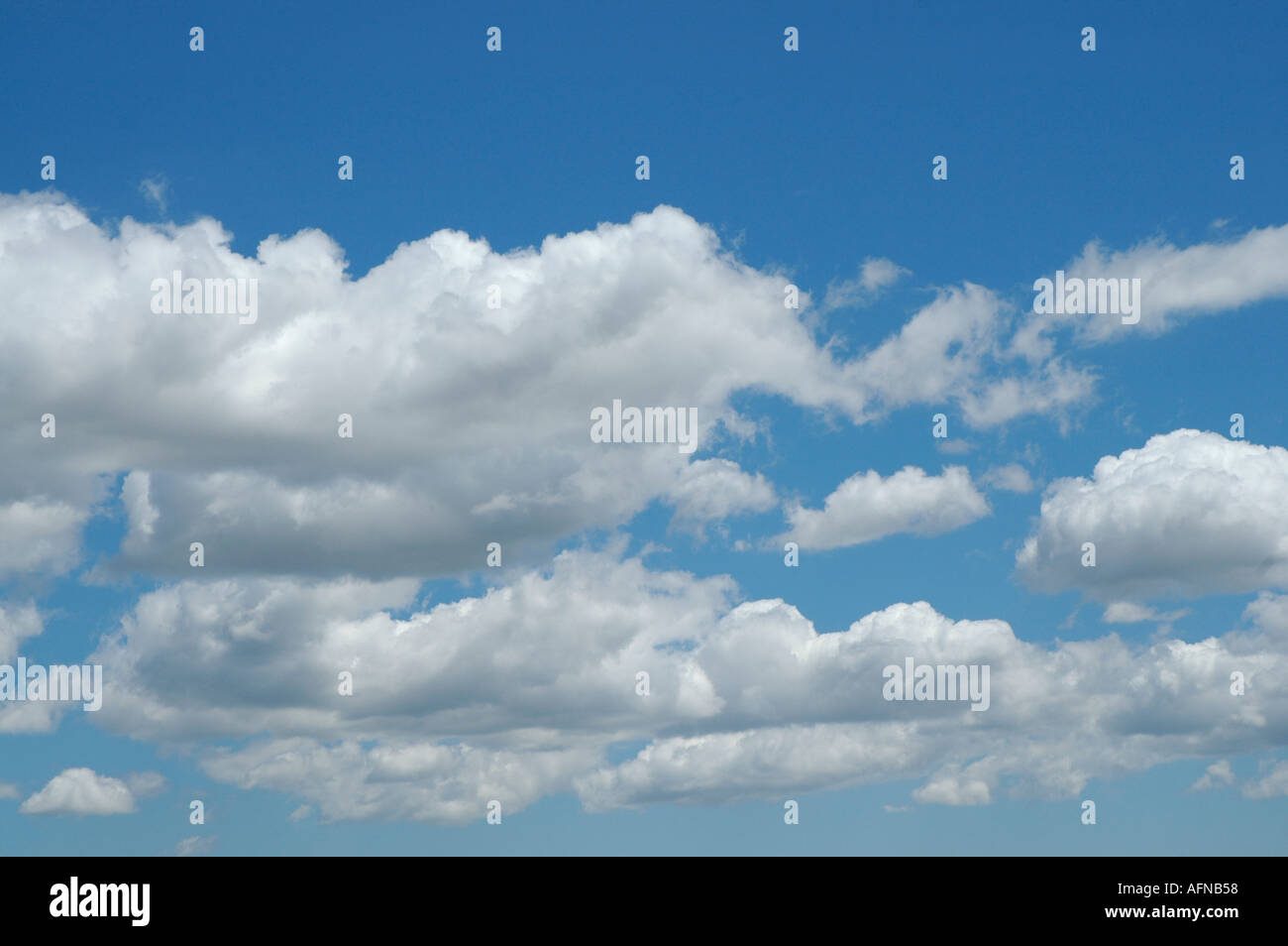 Cloud patterns against a blue sky Stock Photo - Alamy