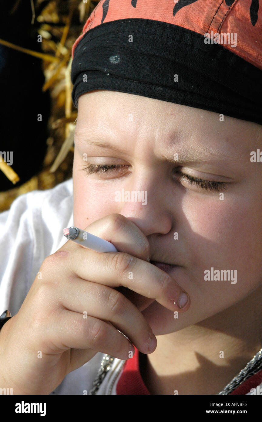 Boy smokes cigarette hi-res stock photography and images - Alamy