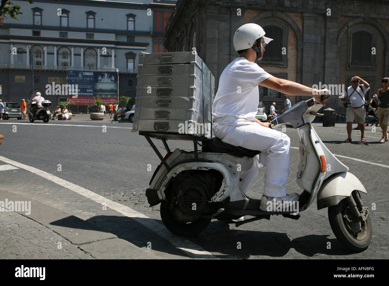Motorcycle delivery man delivers gran hi-res stock photography and ...