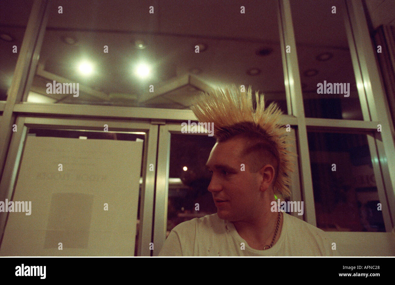 A generation x punk rocker sports a mohawk during a punk show punk ...