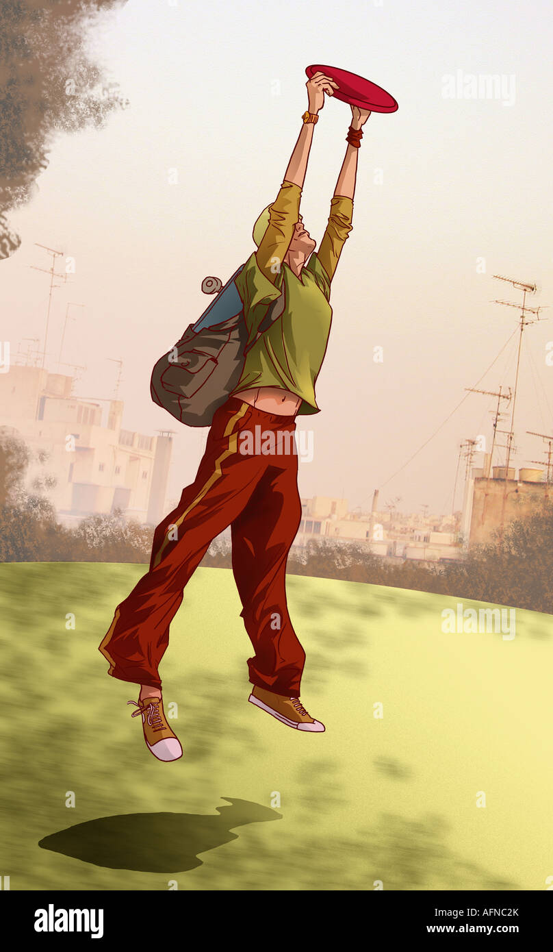 Man jumping and catching a plastic disc Stock Photo - Alamy