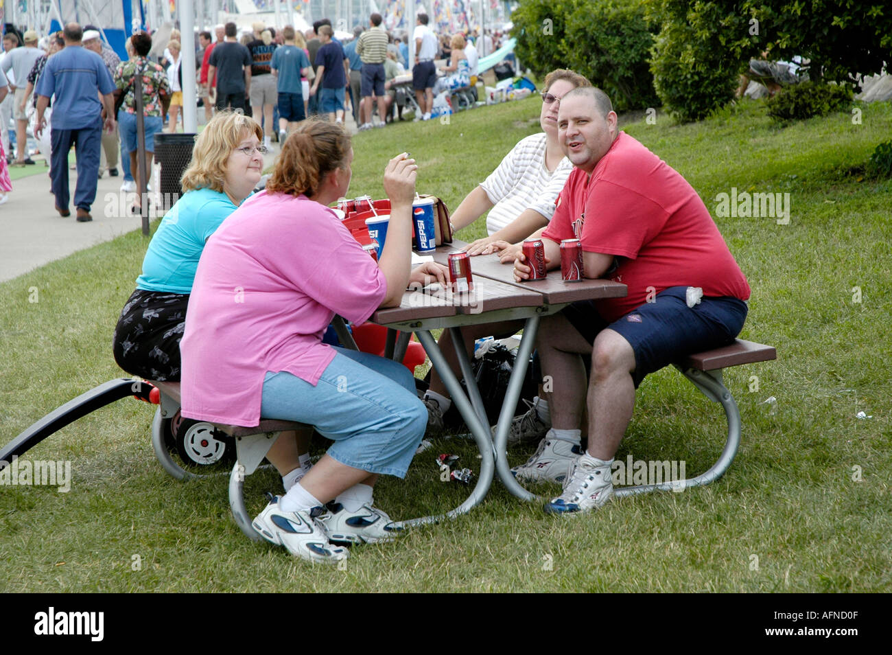Group of 4 overweight people attend a festival in Port Huron Michigan ...