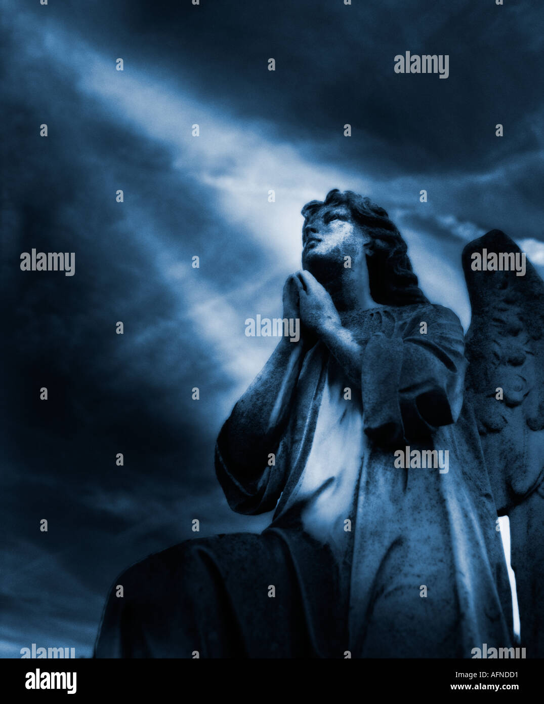 angel and divine light Stock Photo - Alamy