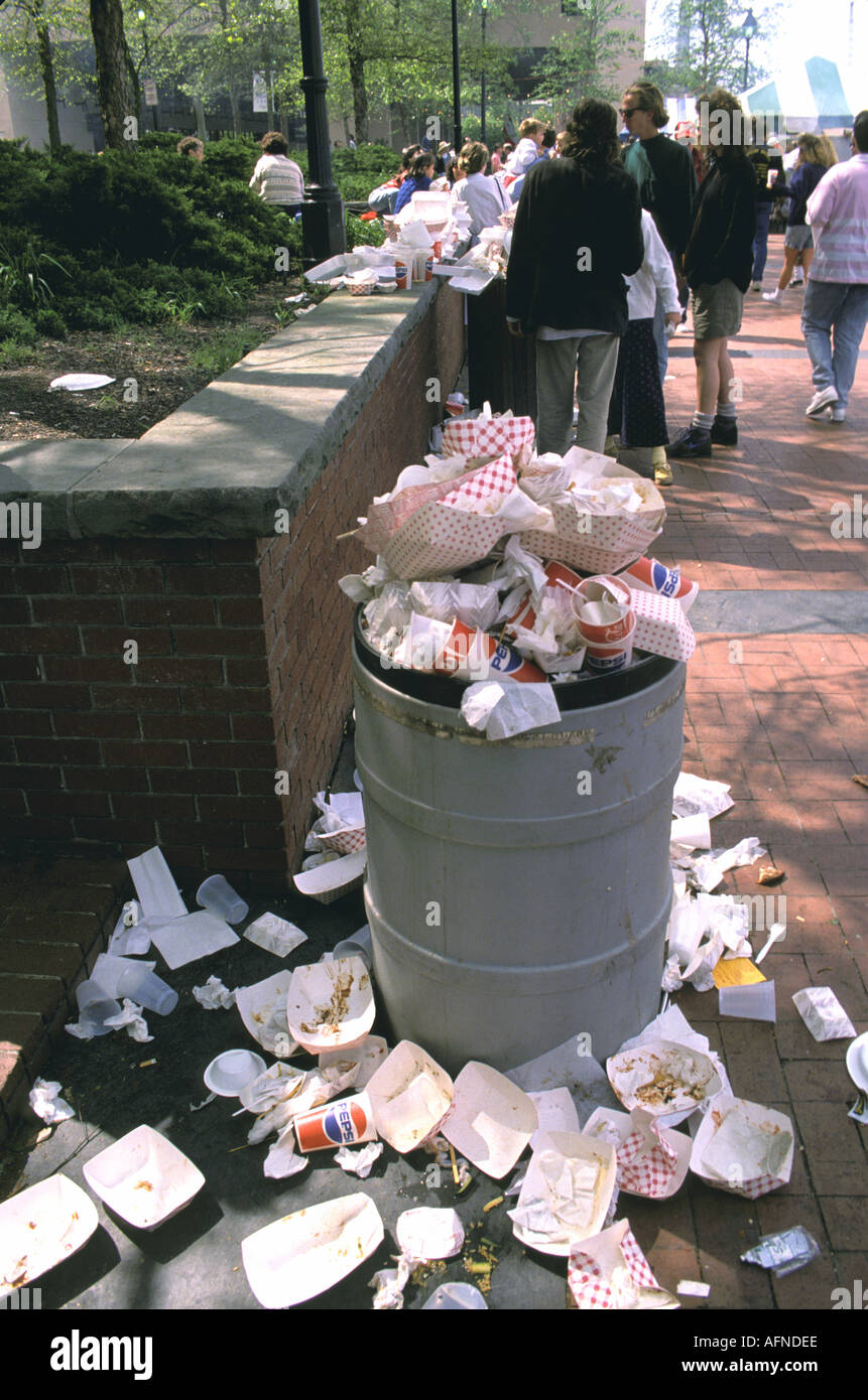 Trash pollution over fill collection containers Stock Photo - Alamy