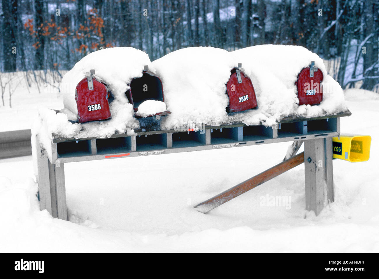Mailboxes are covered with white snow after storm Stock Photo - Alamy