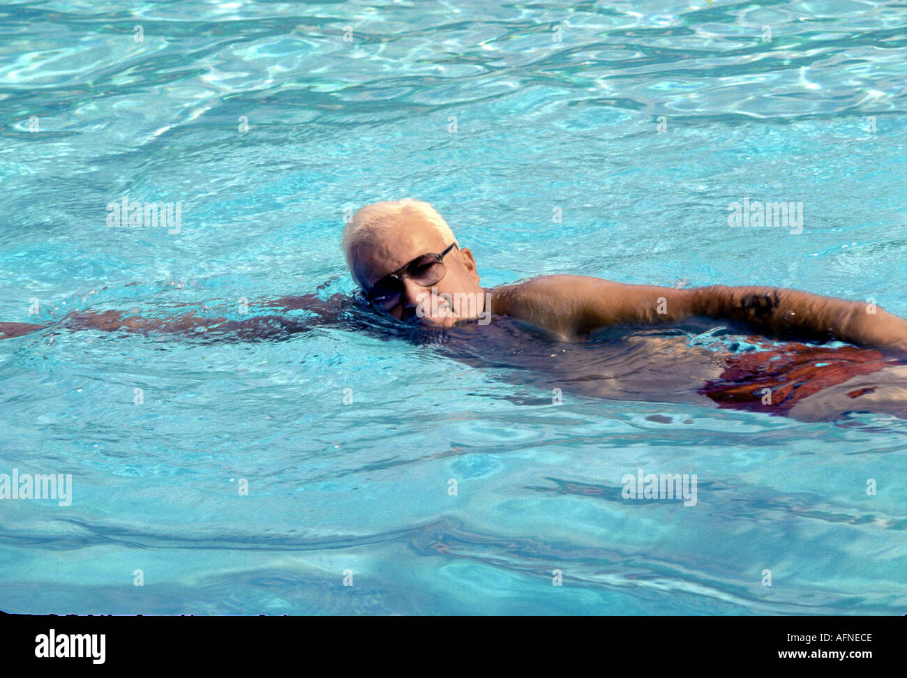 Seniors exercise in a swimming pool Stock Photo - Alamy