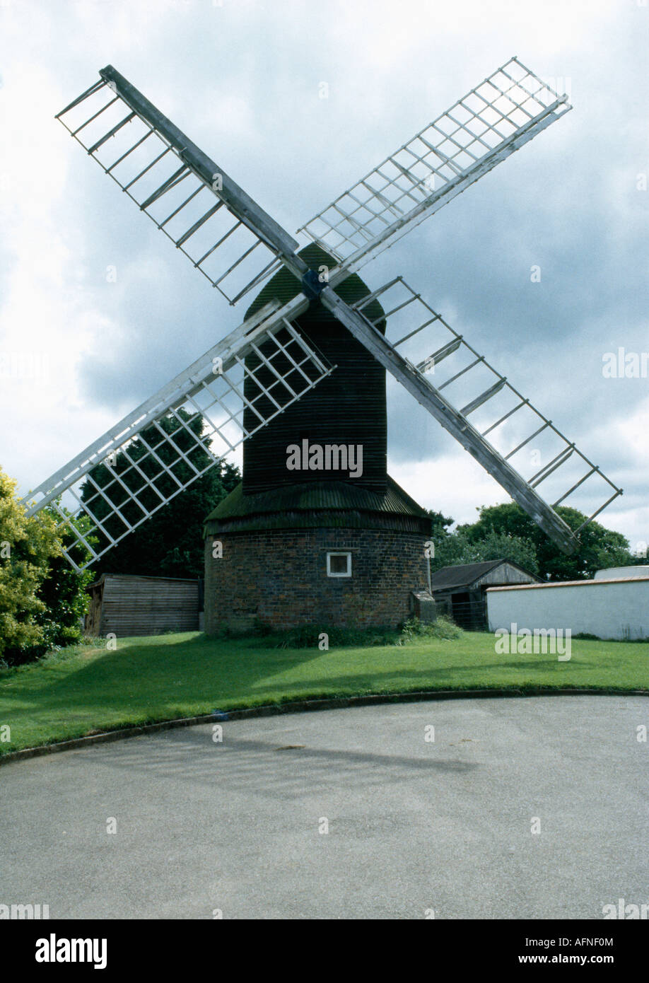 Traditional windmill with sails Stock Photo - Alamy