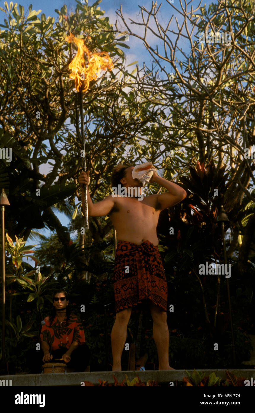 Hawaiian performers no model release blowing conch shell horns Maui ...