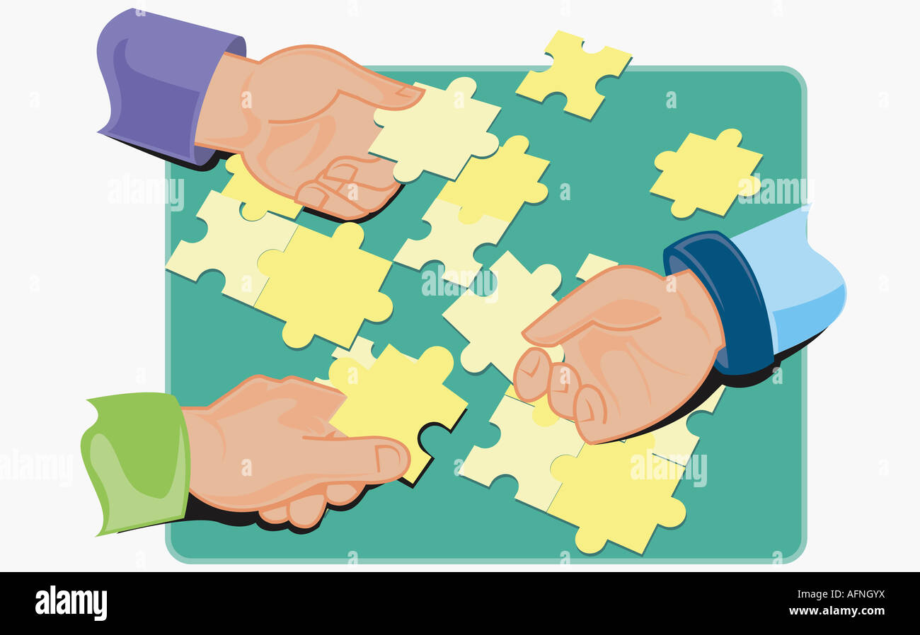 Human hands holding jigsaw pieces Stock Photo - Alamy