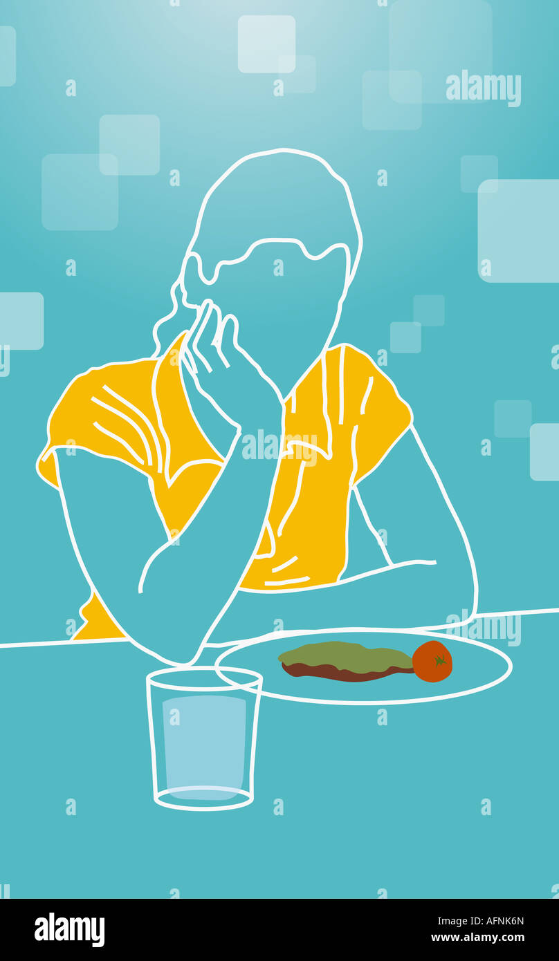 Woman sitting at the dining table Stock Photo - Alamy