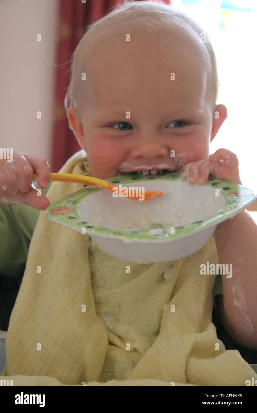 baby boy in food mess Stock Photo - Alamy