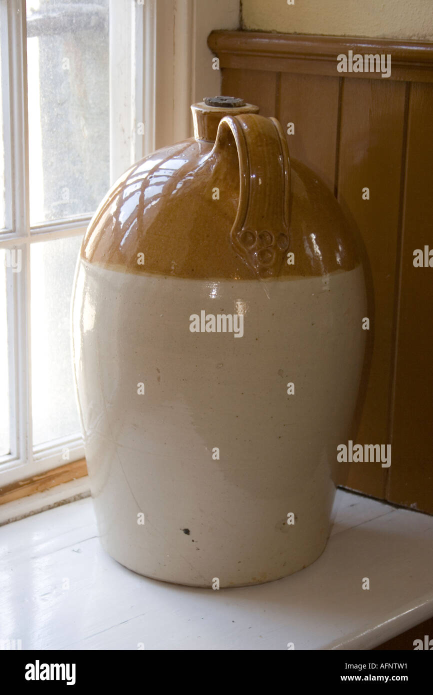 old water jug on window Stock Photo - Alamy