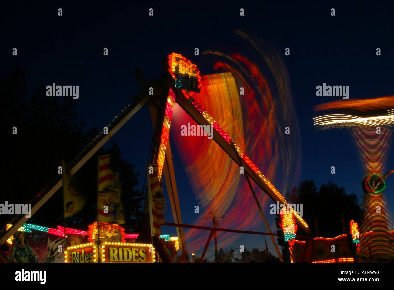 CARNIVAL RIDES Night time on the midway, Stampede Paark, Calgary ...