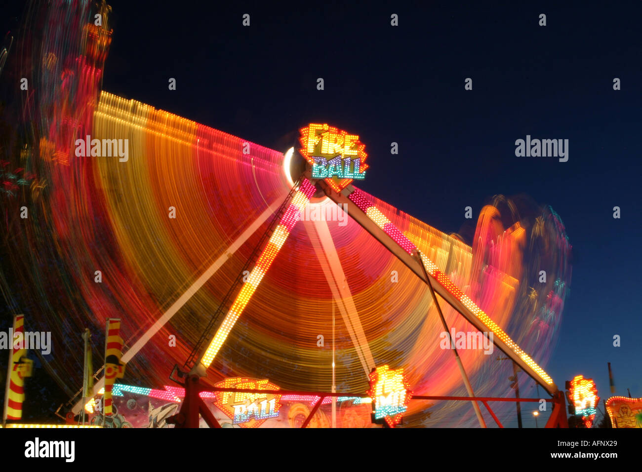 CARNIVAL RIDES Night time on the midway at the Calgary Stampede ...
