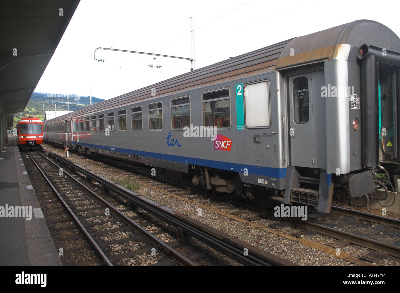 Mont Blanc Express metre gauge train alongside a standard gauge French ...
