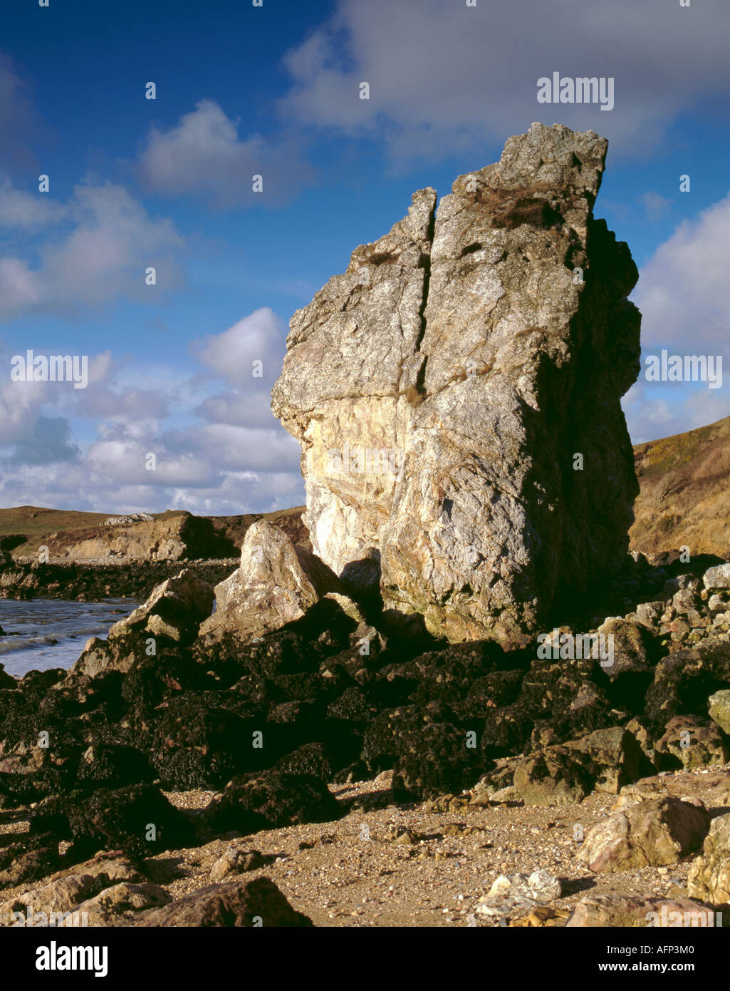 Rock pillar on sea shore; Porth Padrig, near Cemaes, on the North ...