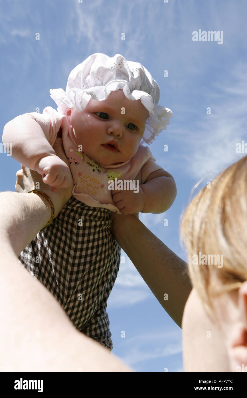 A four month old baby girl with her mother Stock Photo - Alamy