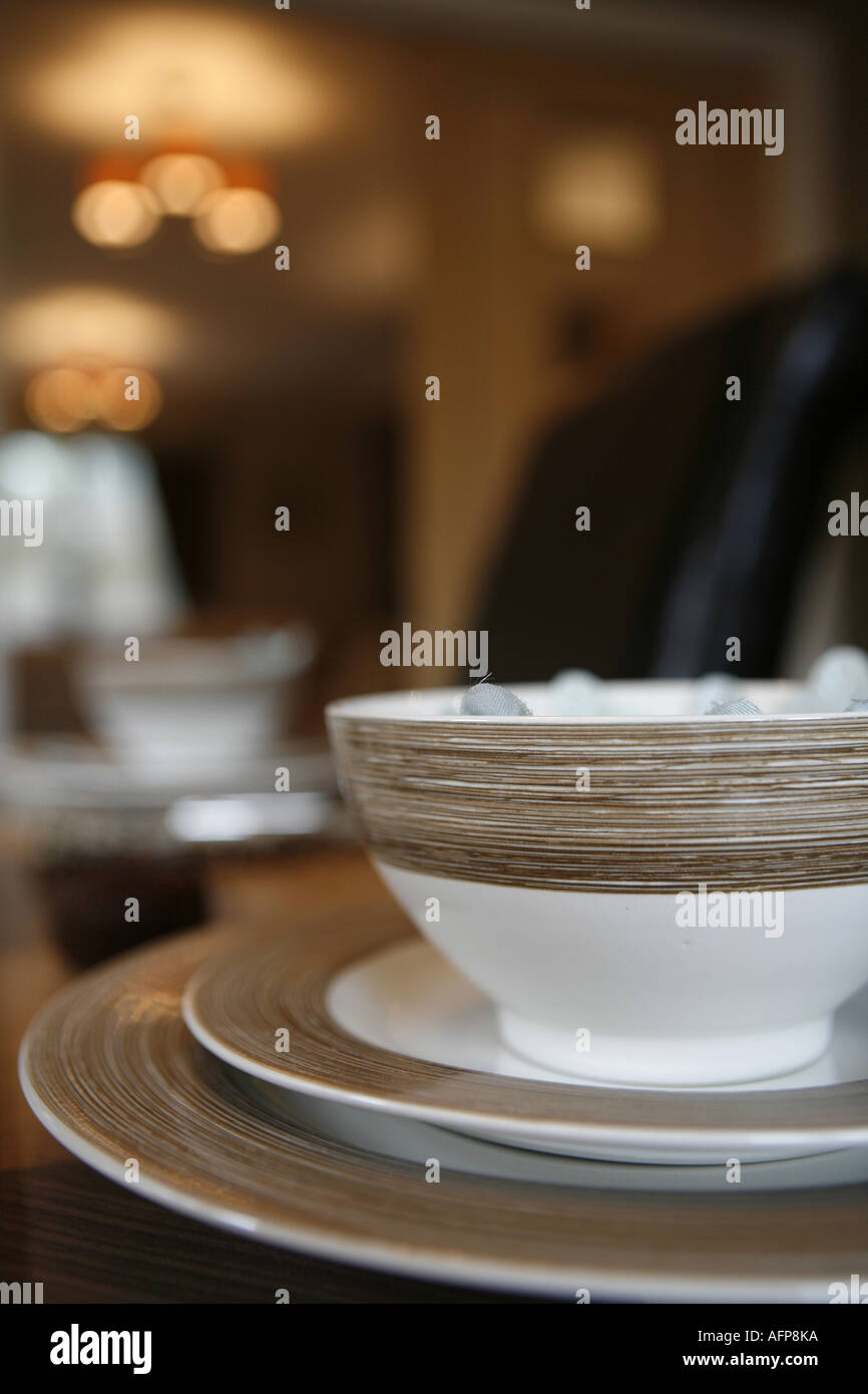 Bowl on a table in a showhome lounge in background Stock Photo - Alamy