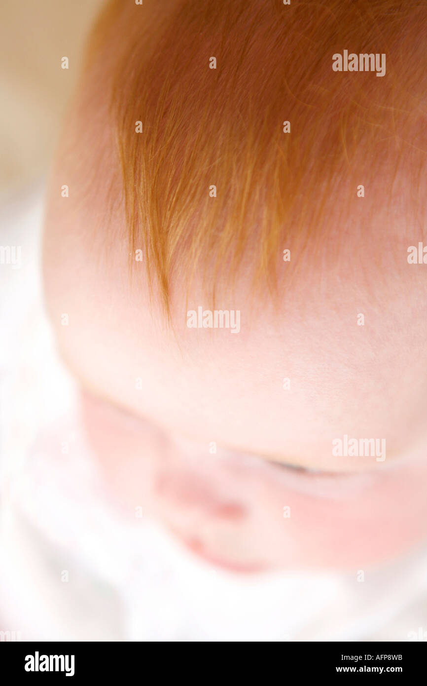 Baby with red hair from above Stock Photo - Alamy