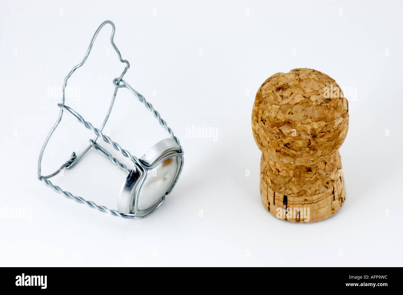 A Champagne cork and wire isolated against a white background Stock ...