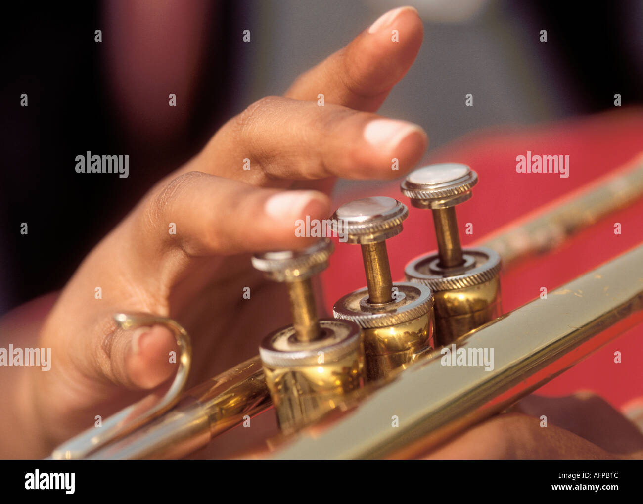 Fingers on instrument valves hi-res stock photography and images - Alamy