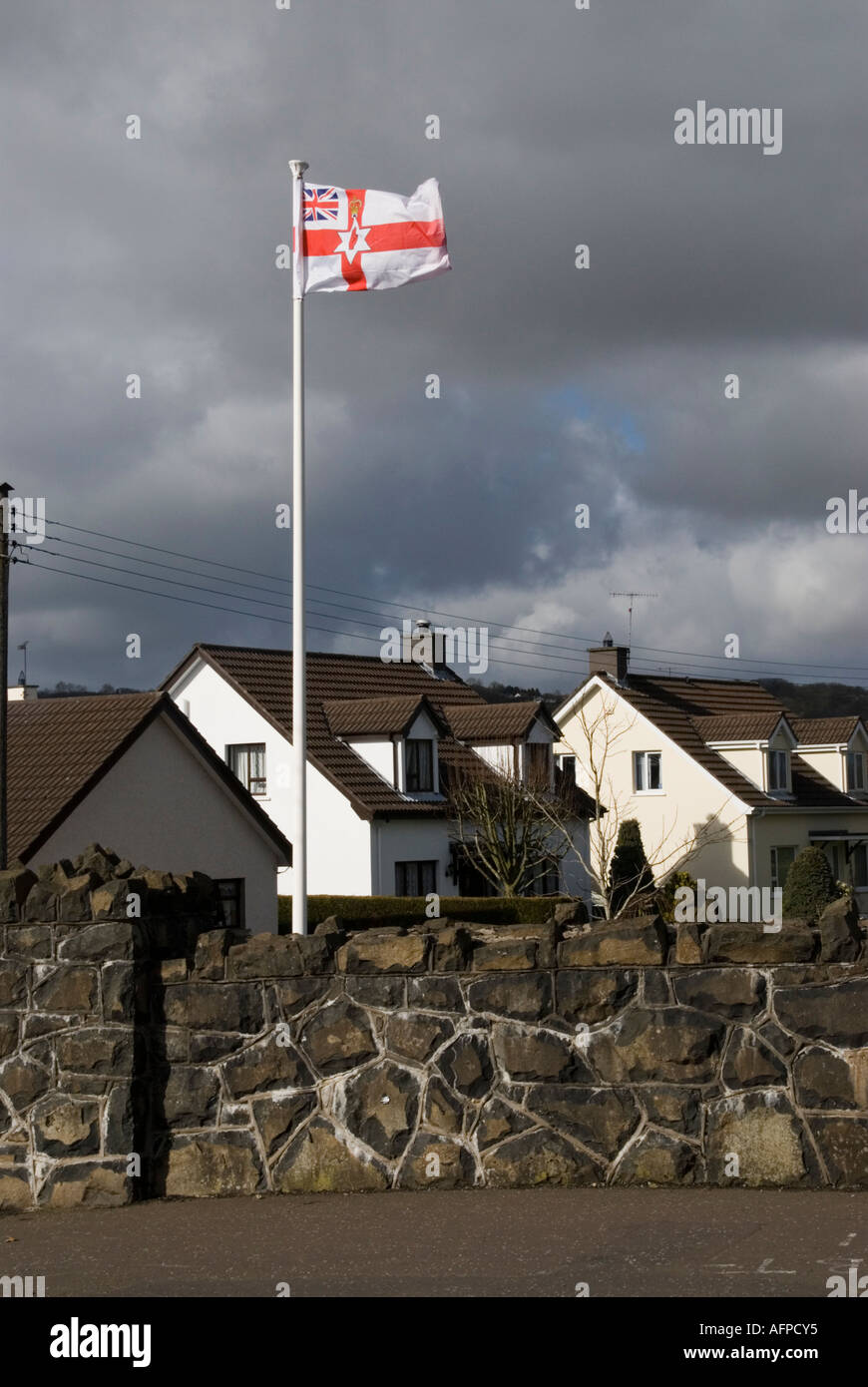 The loyalist Ulster Unionist flag flies over the village of Broughshane ...