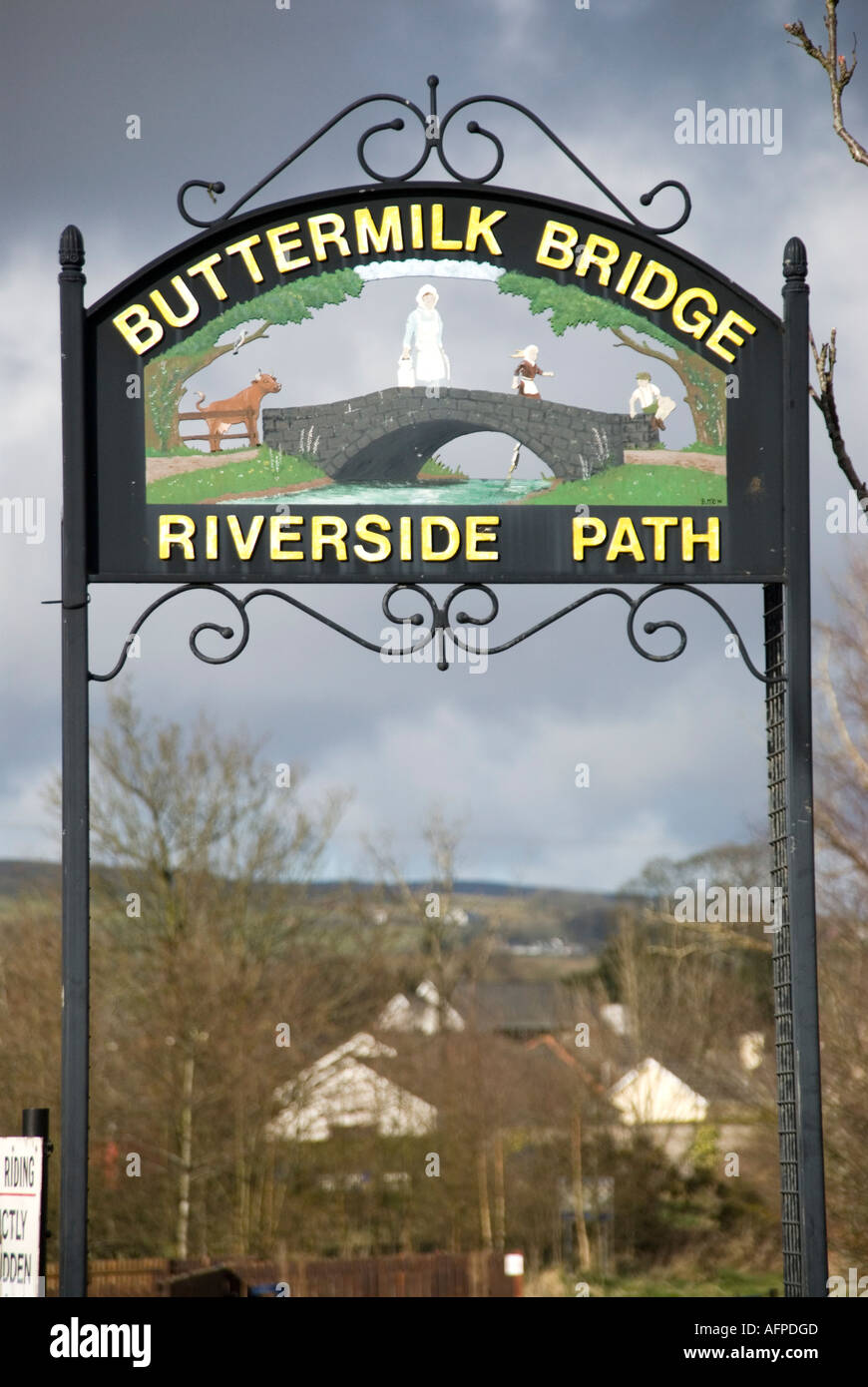 Sign marking the Buttermilk Bridge riverside path in Broughshane ...