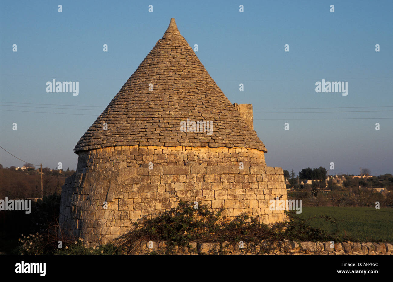 trulli (traditional round-stone building Stock Photo - Alamy