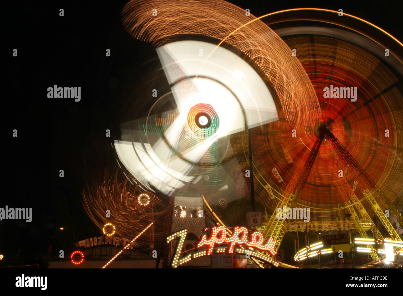 CARNIVAL RIDES Night time on the midway at the Calgary Stampede ...
