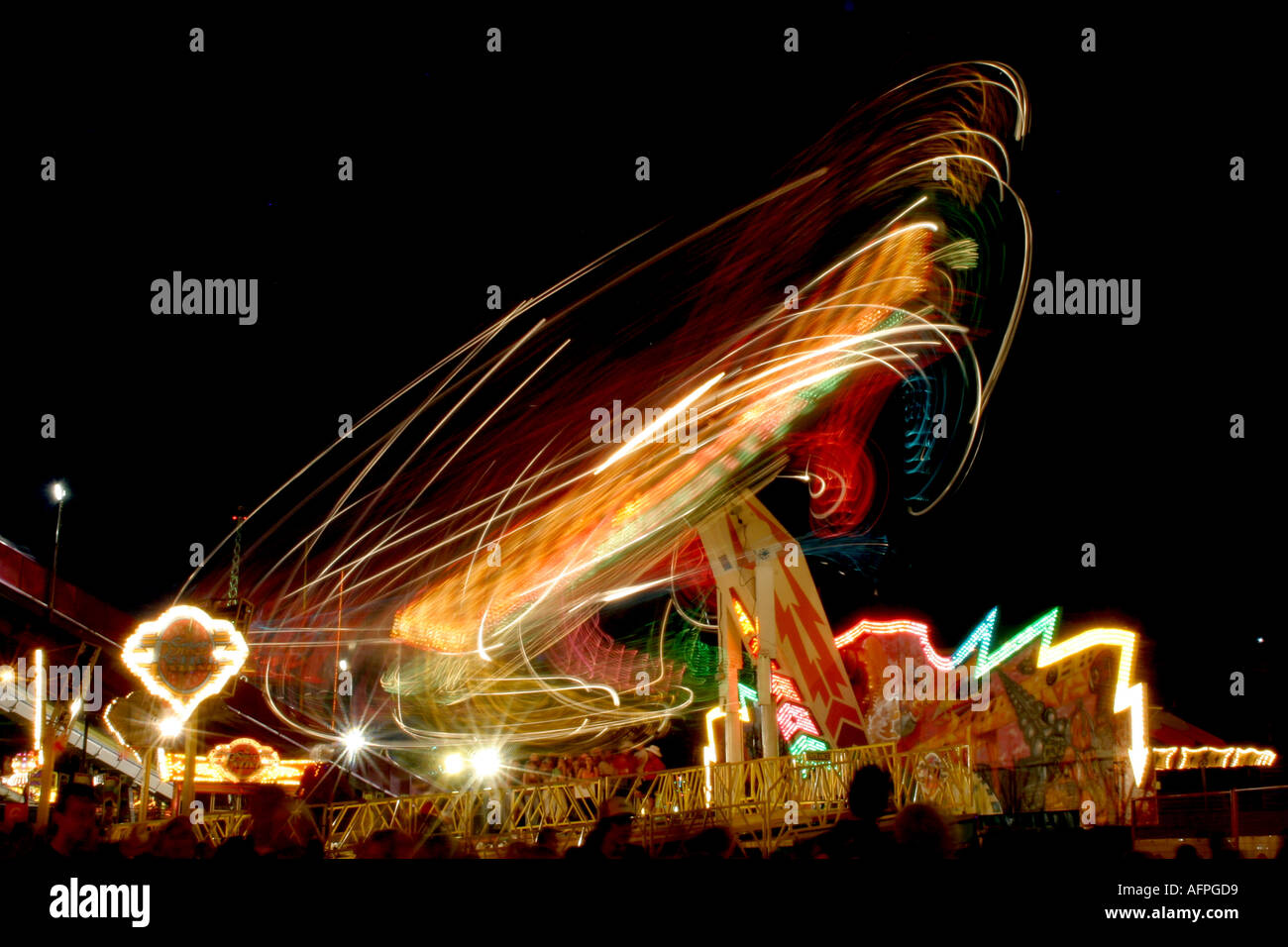 CARNIVAL RIDES Night time on the midway at the Calgary Stampede ...