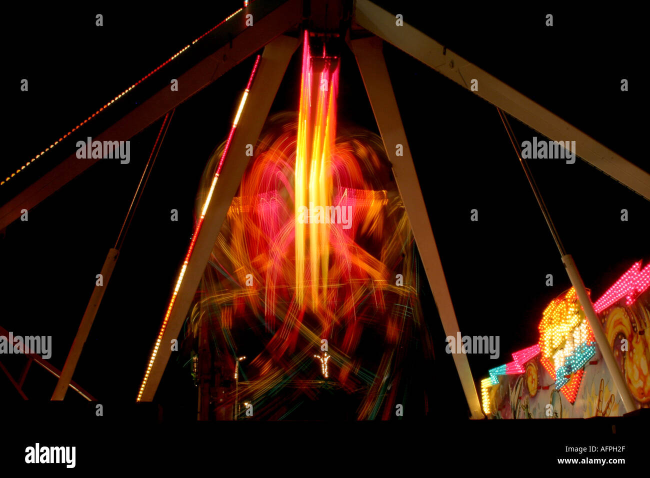 CARNIVAL RIDES Night time on the midway at the Calgary Stampede ...