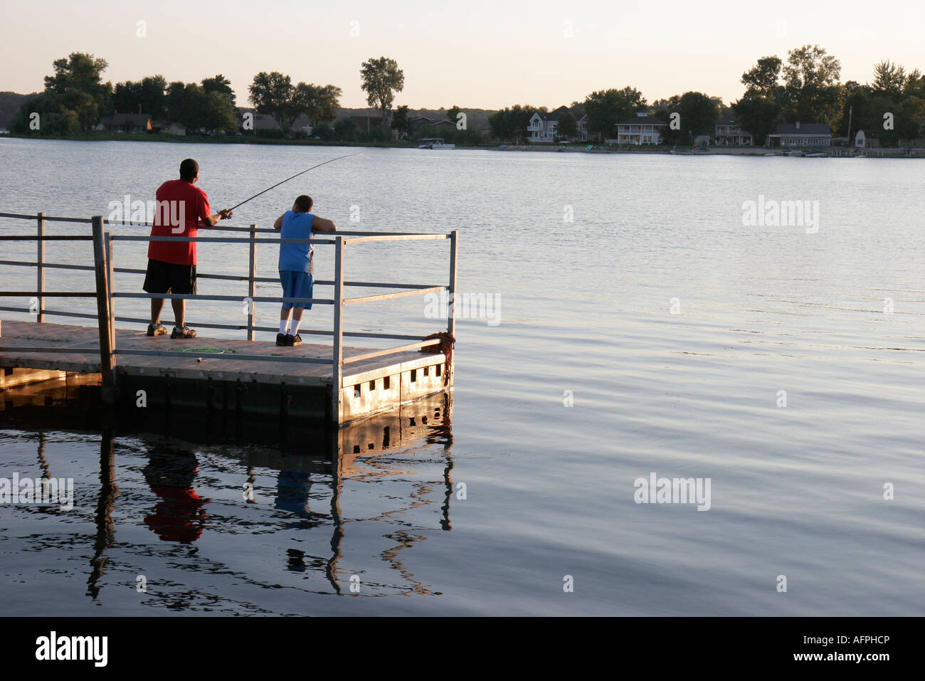 Black boys fishing hi-res stock photography and images - Alamy