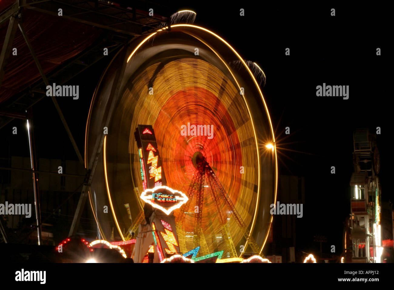 CARNIVAL RIDES Night time on the midway at the Calgary Stampede ...