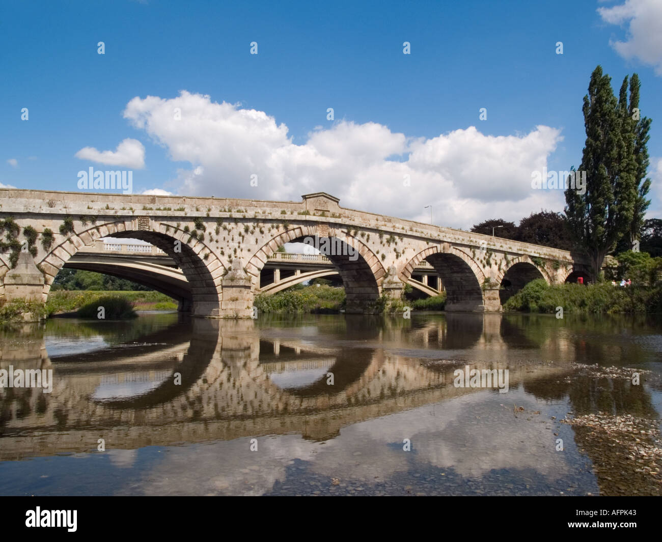 ATCHAM OLD STONE BRIDGE over River Severn in summer Shropshire England ...