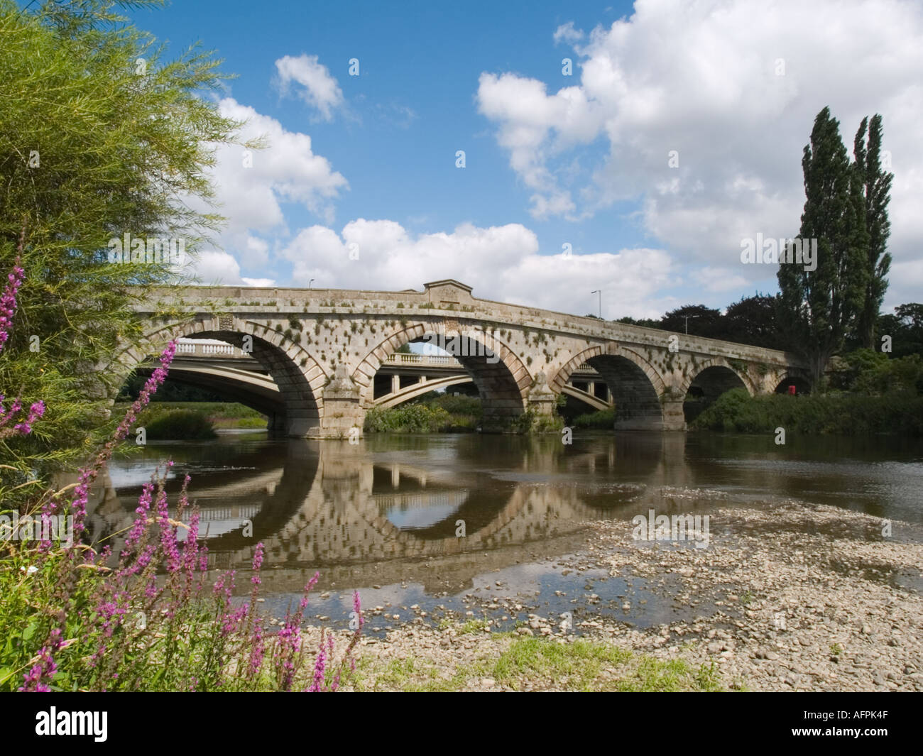 ATCHAM OLD STONE BRIDGE over River Severn in summer Shropshire England ...