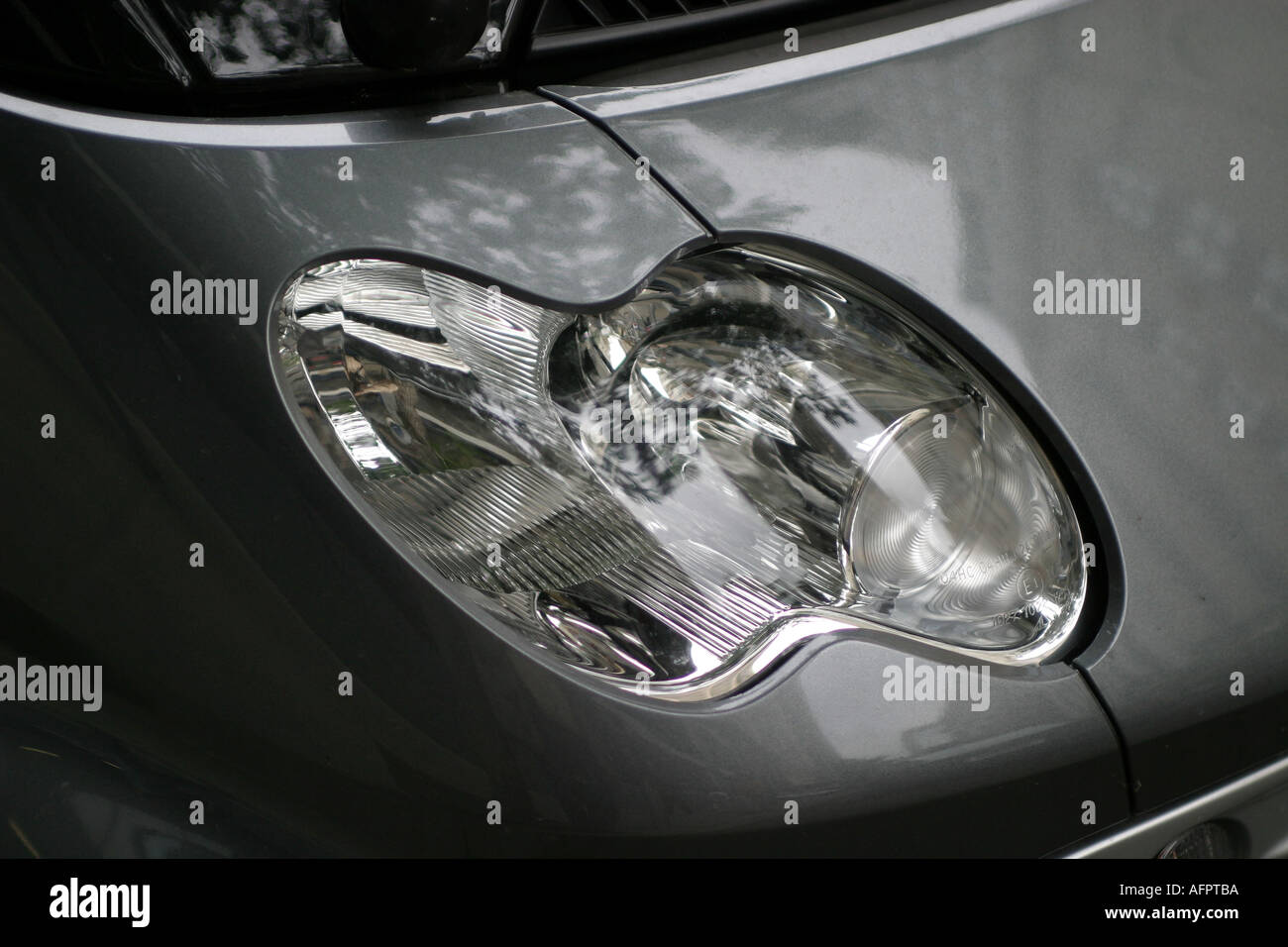 Unusual headlight on a new vehicle Stock Photo - Alamy