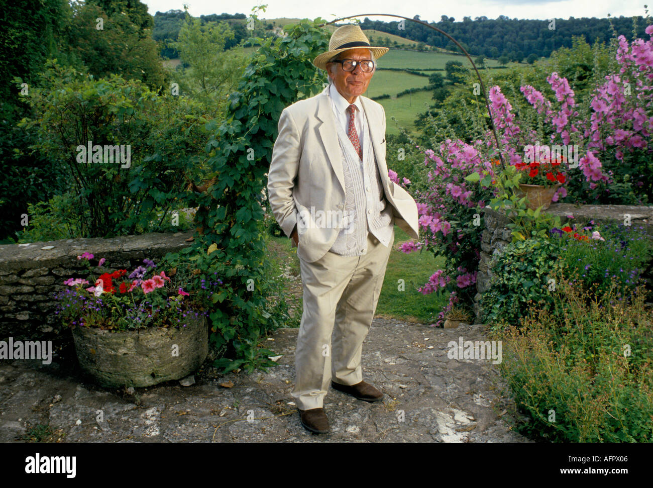 Laurie Lee author in the garden of his home in the village of Slad ...