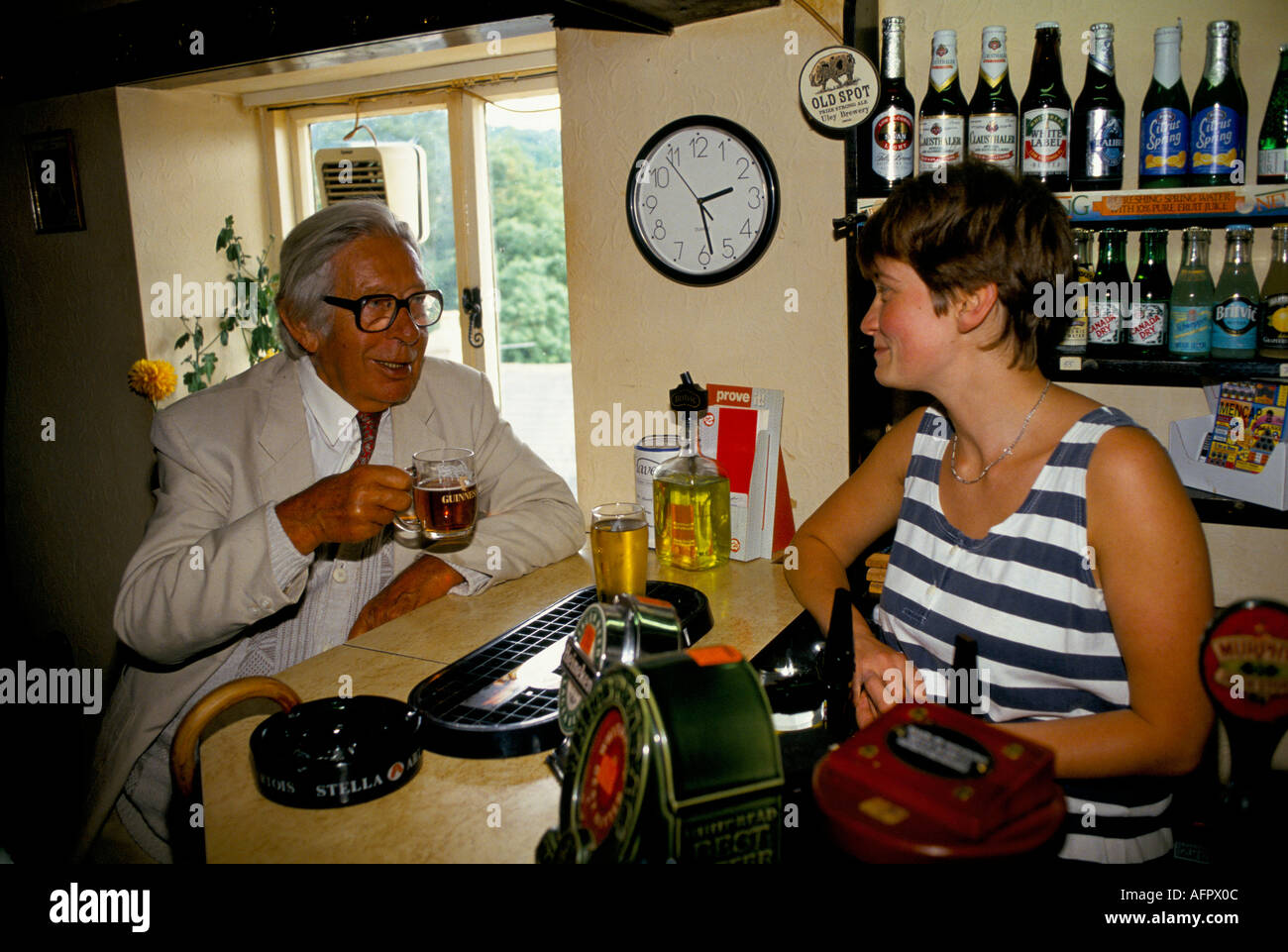 Laurie Lee author in his local pub The Woolpack ordering a lunchtime ...