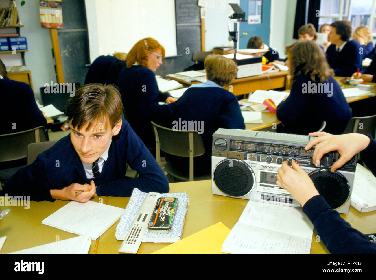 1990s Schools UK. GCSE pupils boys girls learning French with tape ...