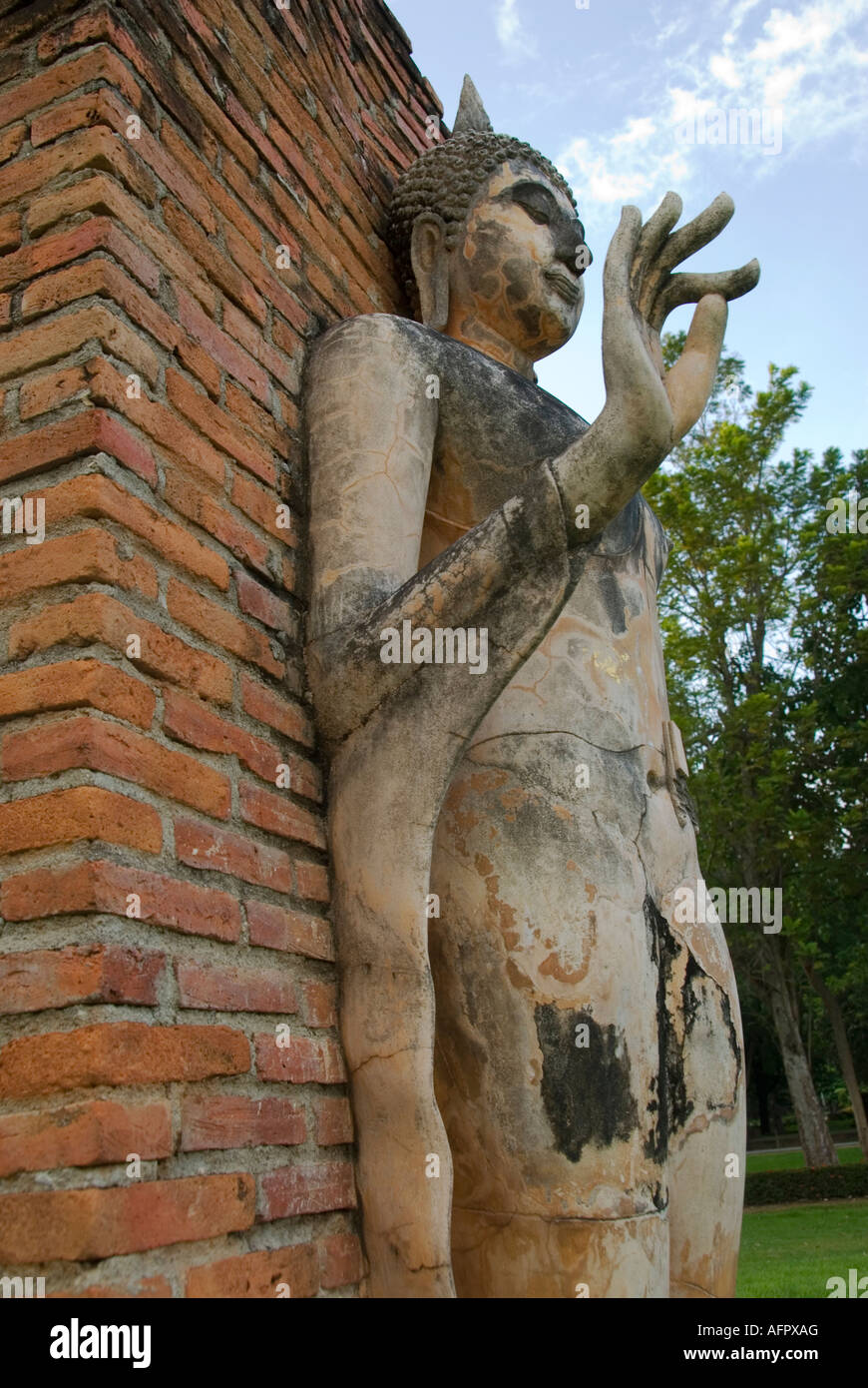 Buddha in standing position with hand gesture Stock Photo - Alamy